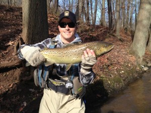 RF Photo of the week: Todd Lemmon holding a nice Brownie - Reel Fish Inc.